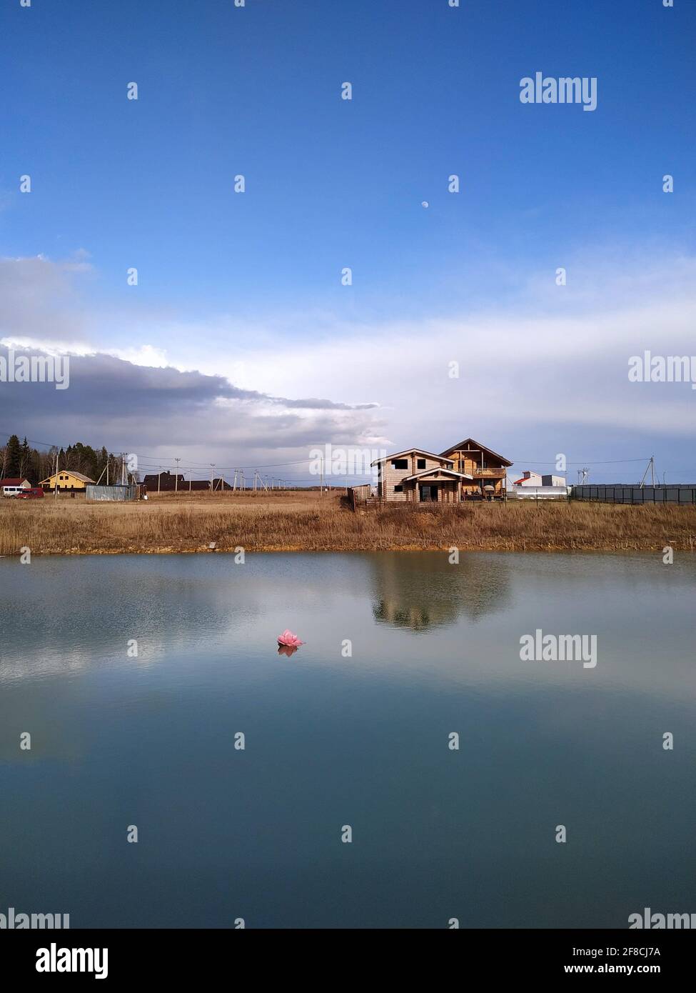 A small house near a body of water Stock Photo - Alamy