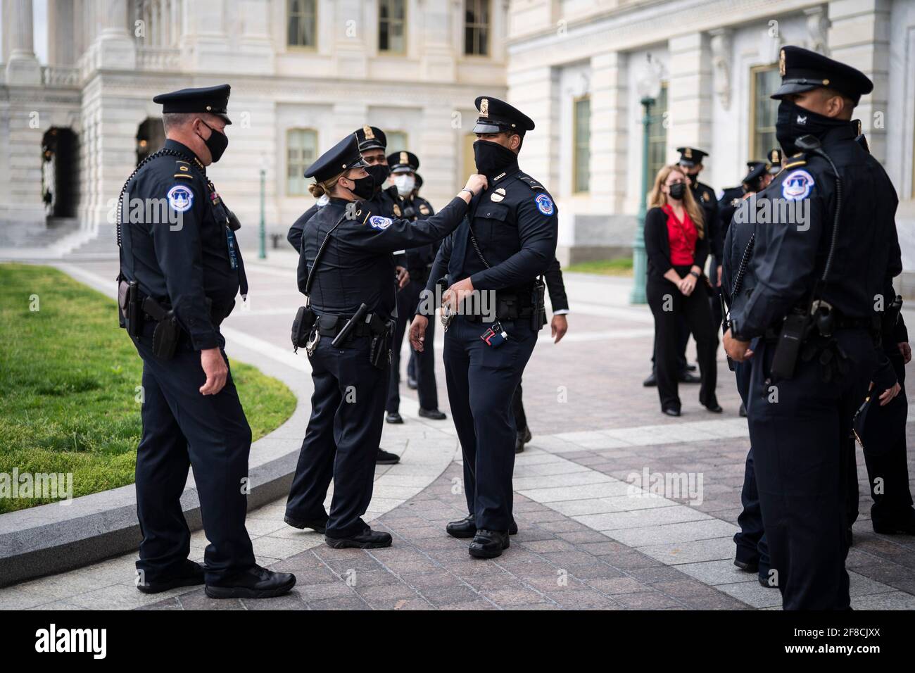 WASHINGTON, DC - APRIL 13: Officers prepare before the casket of ...