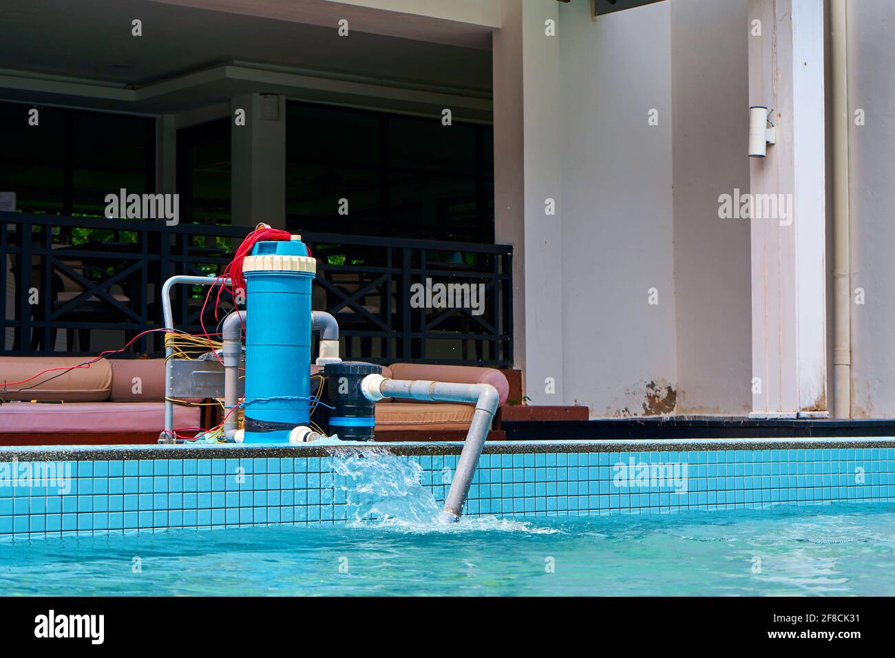 A filter pump cleans the pool water. Device for automatic cleaning of ...