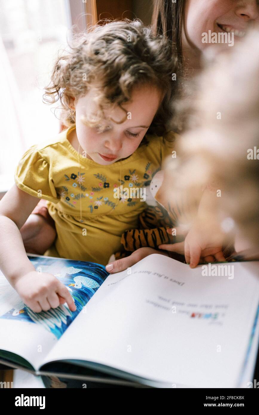 Content woman with child hi-res stock photography and images - Alamy