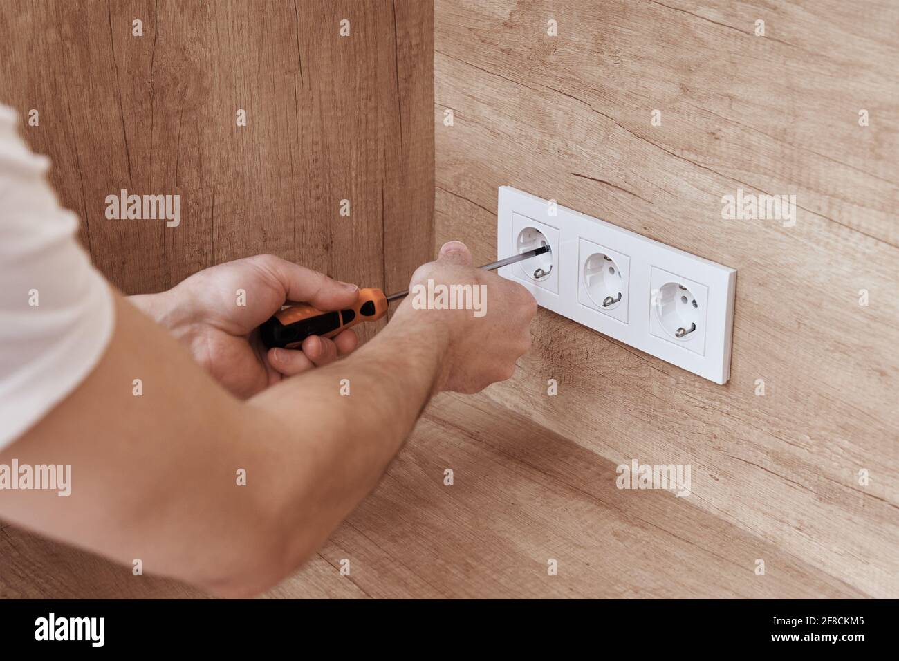 Installing socket hi-res stock photography and images - Alamy