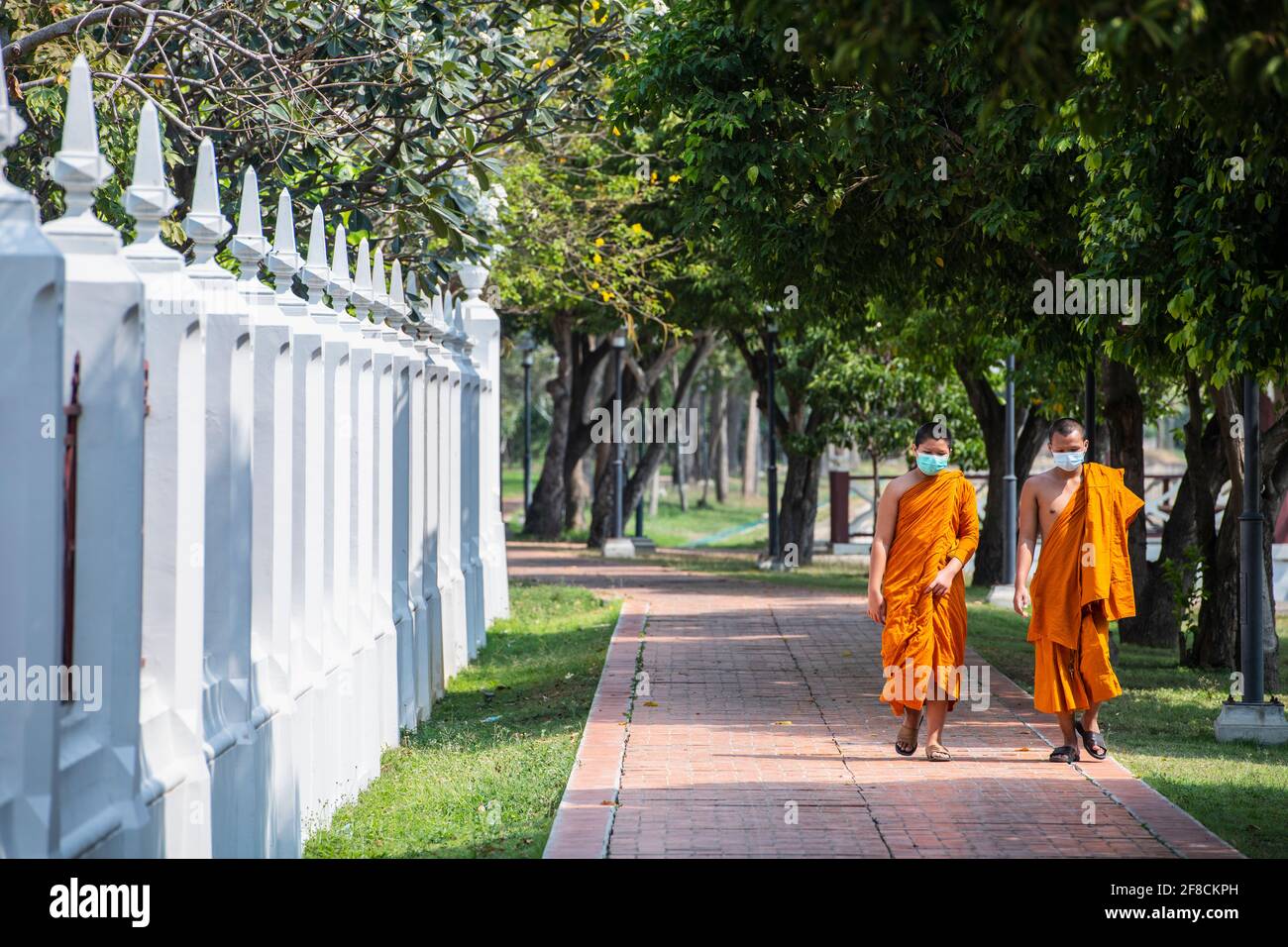 Facemask in the temple hi-res stock photography and images - Alamy