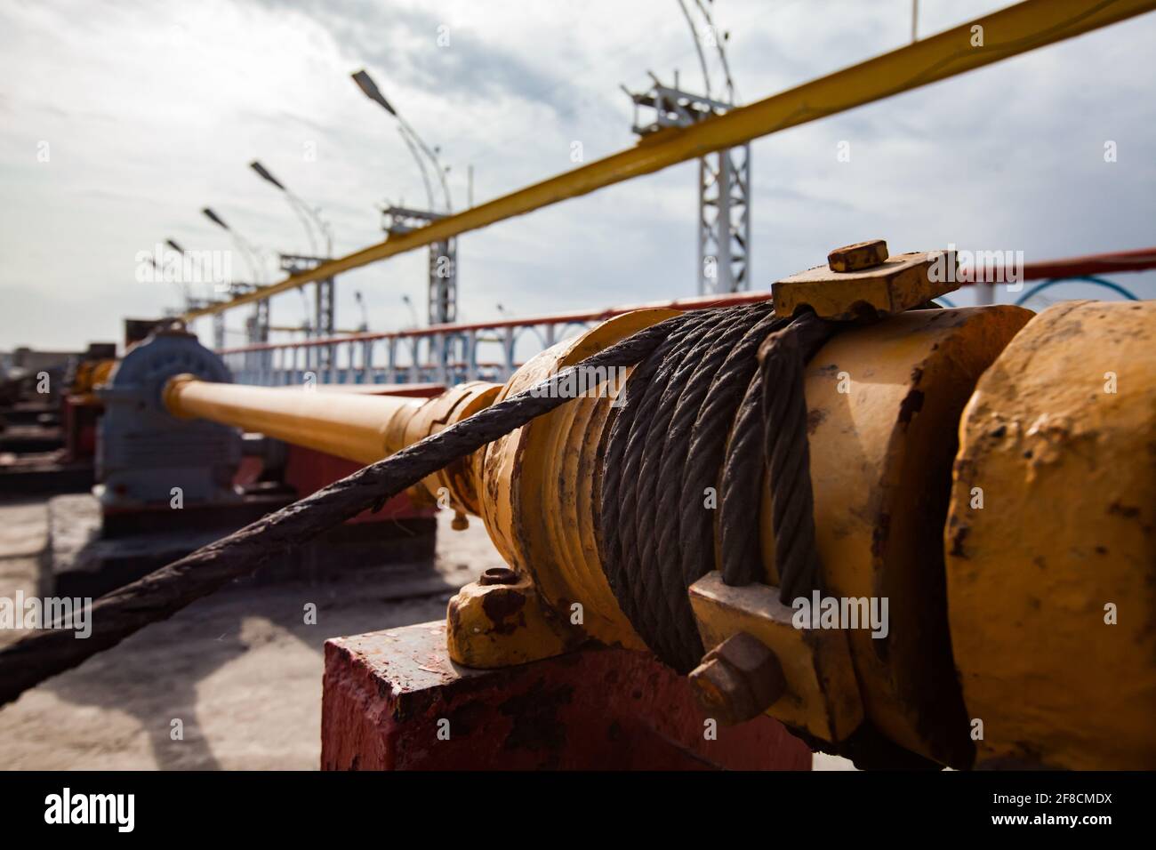 Hoisting device of dam shutter. Power steel rope close-up. Shardara ...