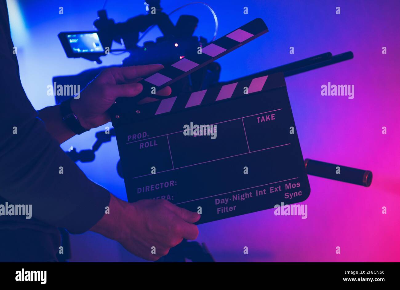 Film Making Professional with Clapperboard in His Hands. Film ...