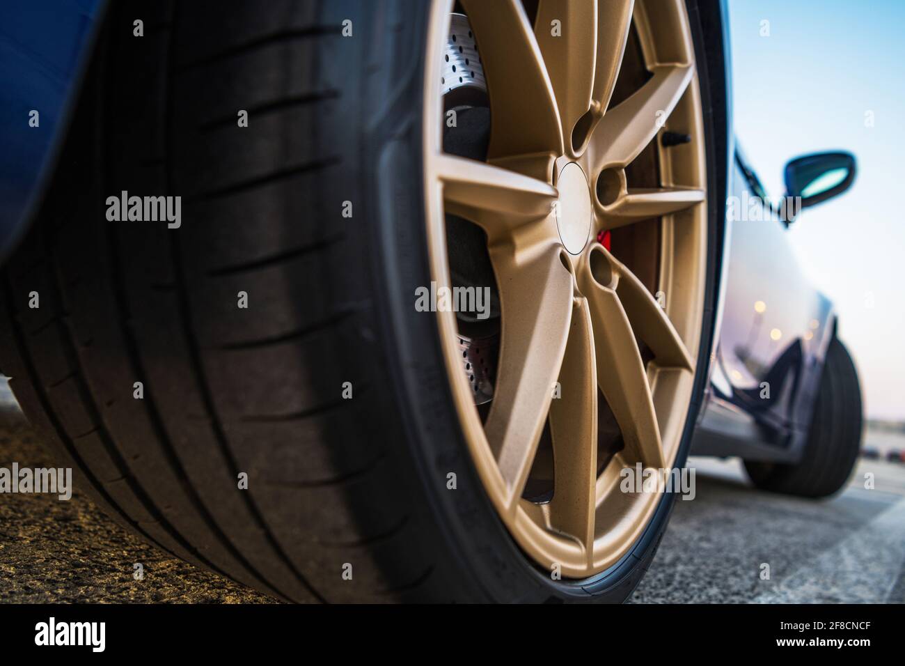 Performance Vehicle Sporty Car Golden Alloy Wheels Ground Level Point ...