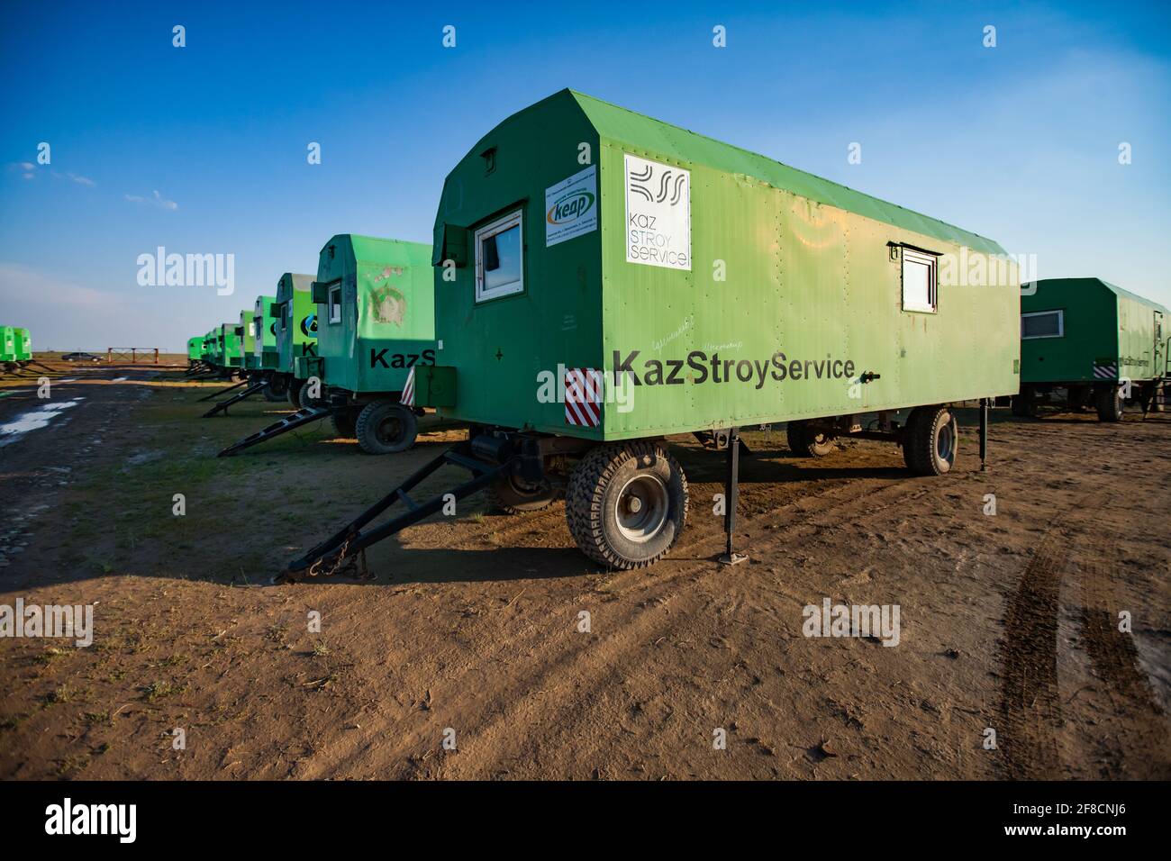 Green construction trailers on paking Stock Photo - Alamy