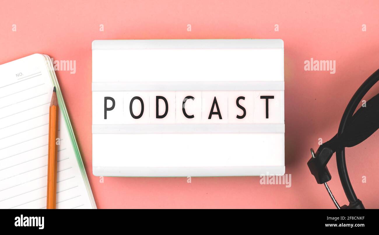 Podcast text on lightbox, flat lay background for broadcasting, top ...