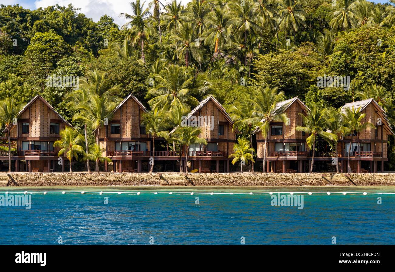 Beautiful resort in the Philippines. Topical huts and houses along the ...