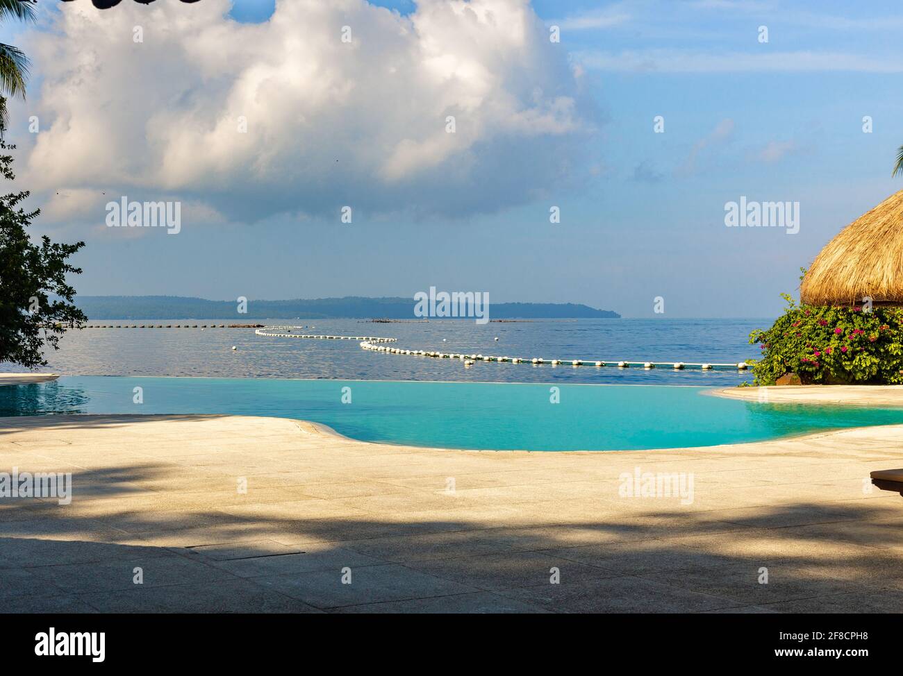 Beautiful beach resort in the Philippines with an infinity pool during ...