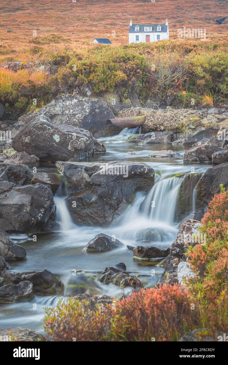 Scenic landscape view of a lone white croft house cottage at Sligachan ...