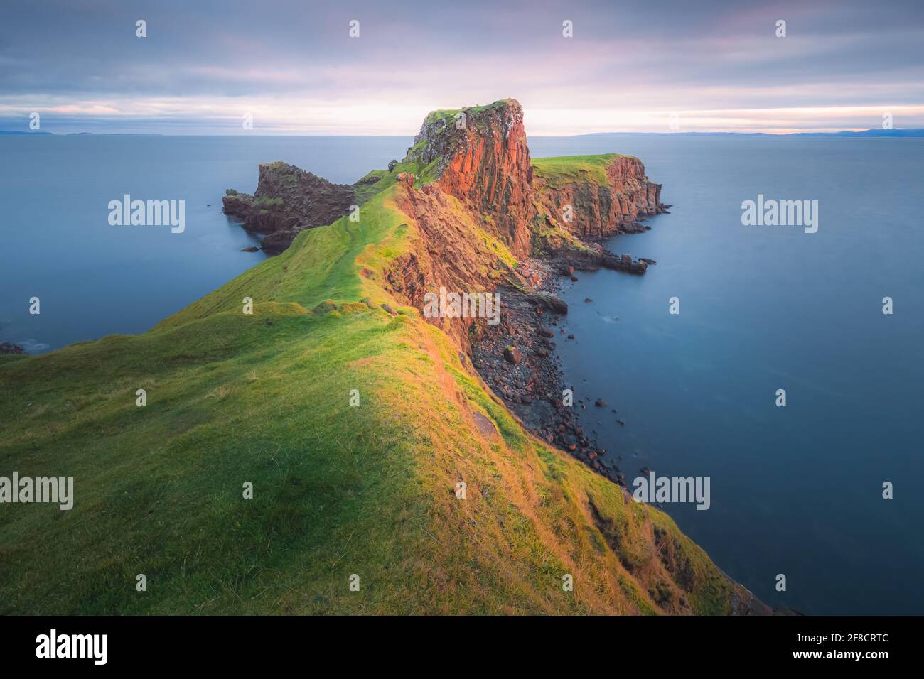 Moody, atmospheric landscape and seascape of Brothers Point peninsula ...
