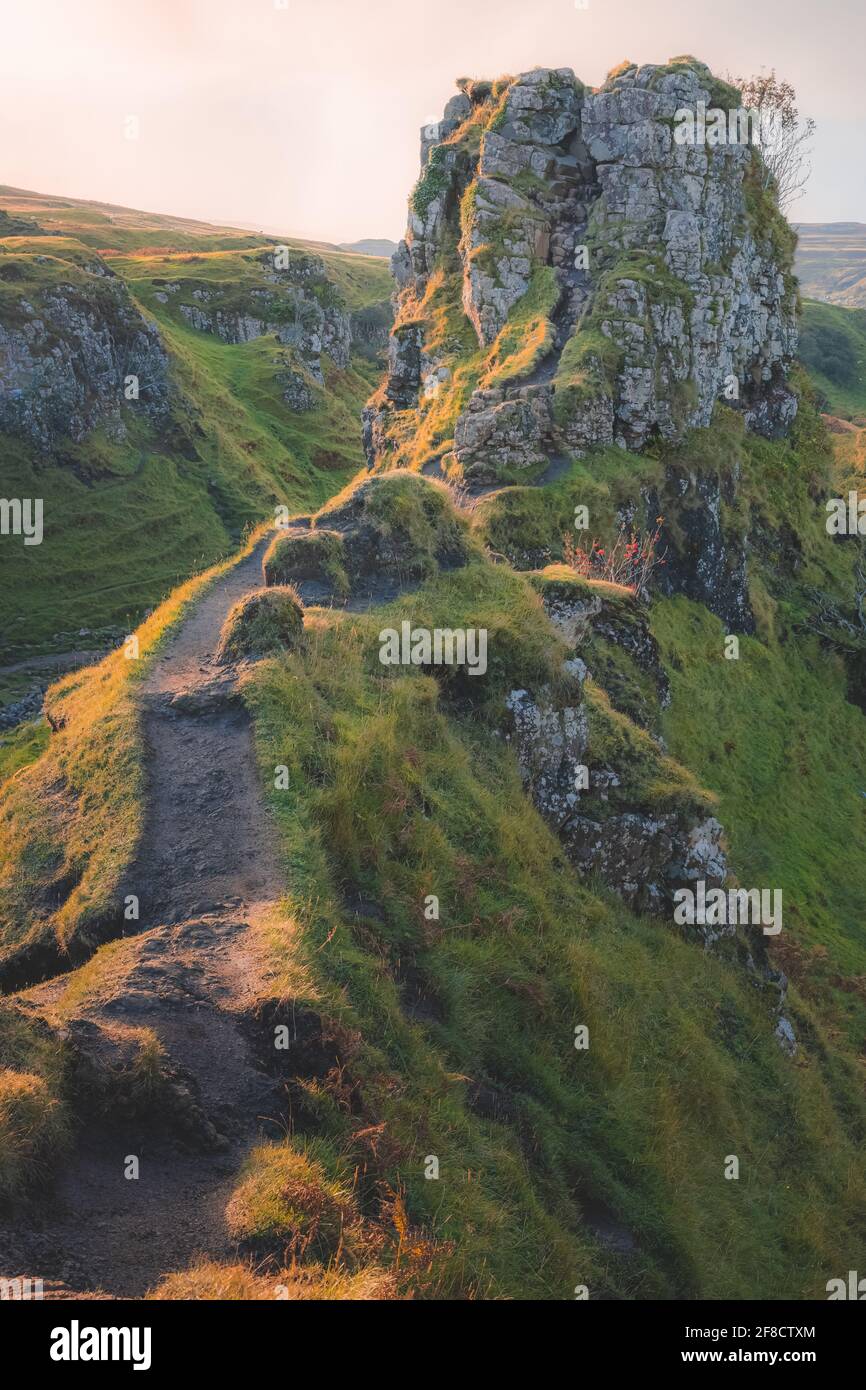 The hilltop tourist attraction Castle Ewan at the Fairy Glen in golden ...