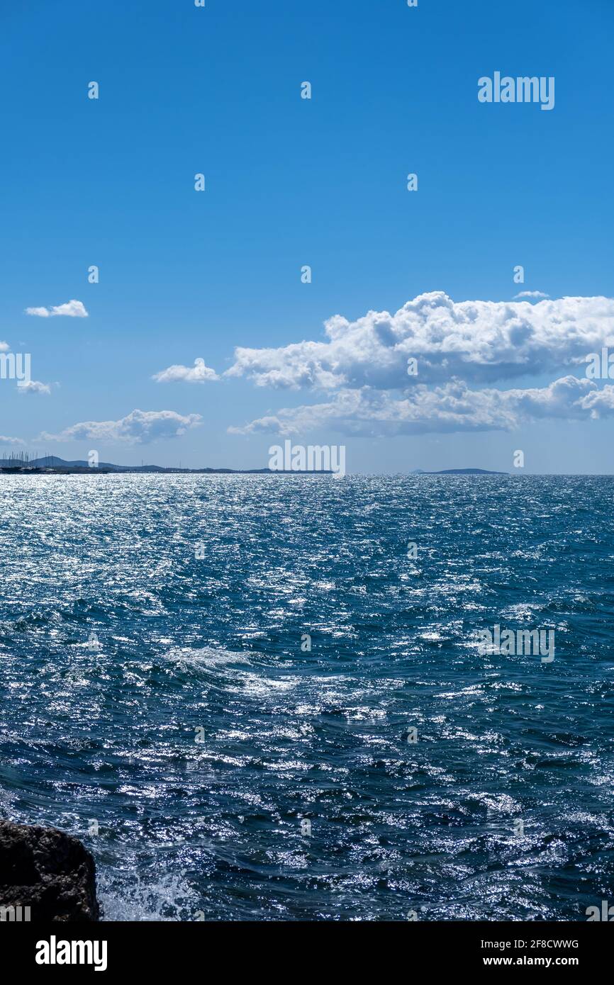 Blue sea and sky horizon background, Sunbeams make sea glowing. White ...