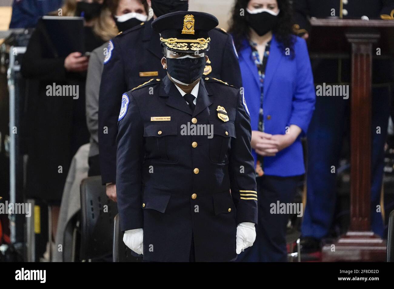 Acting U.S. Capitol Police chief Yogananda Pittman stands as slain U.S ...