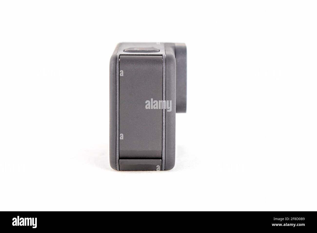 New 4K action camera in black color. Isolated white background. side ...