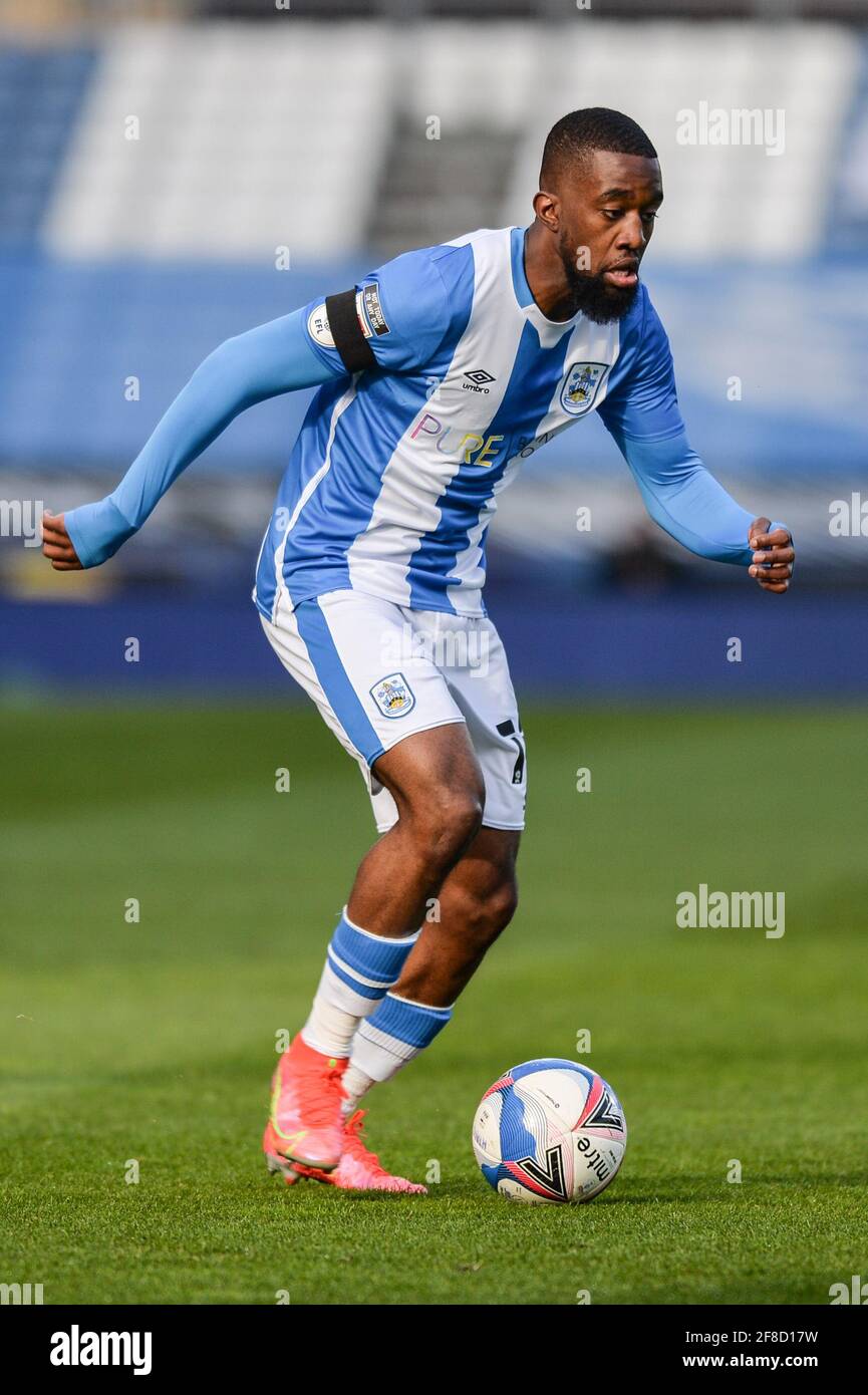 Huddersfield, UK. 23rd Mar, 2021. Isaac Mbenza (18) of Huddersfield ...