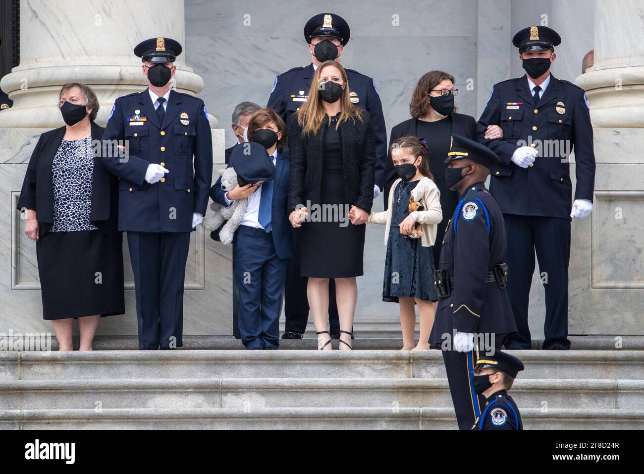The family of US Capitol Police Officer William "Billy" Evans looks on ...