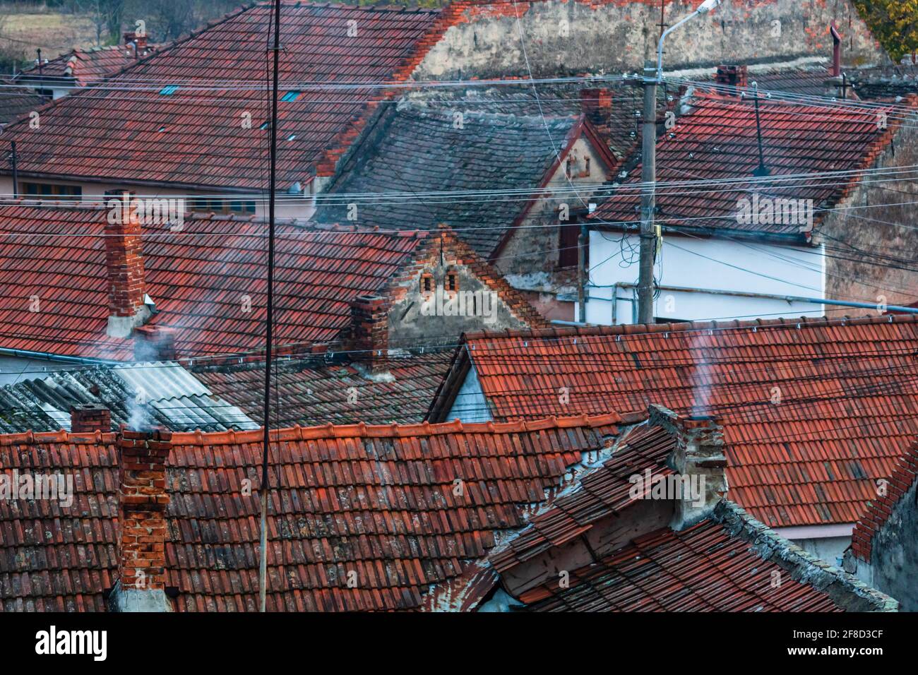 Overview of tile rooftops of old houses. Old buildings architecture ...