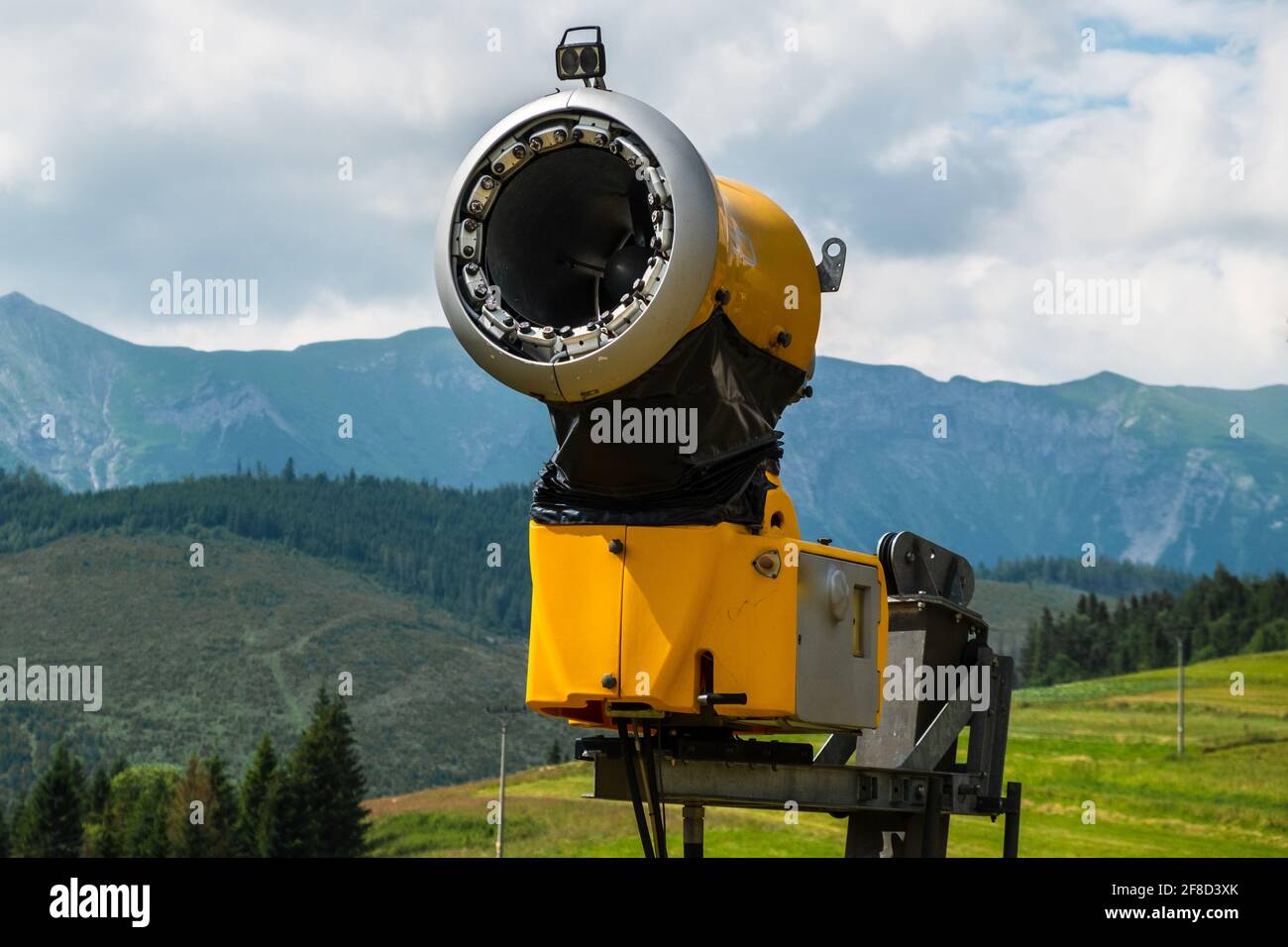 Snow cannon in mountains. Snow gun for making artificial snow Stock ...