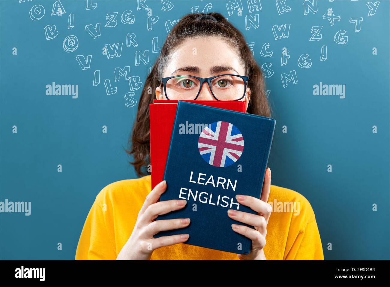 English language day. Portrait of a young woman holding english ...