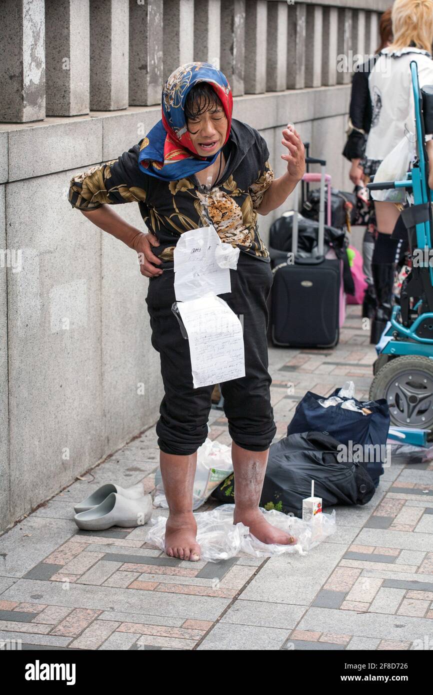 Barefoot homeless hi-res stock photography and images - Alamy