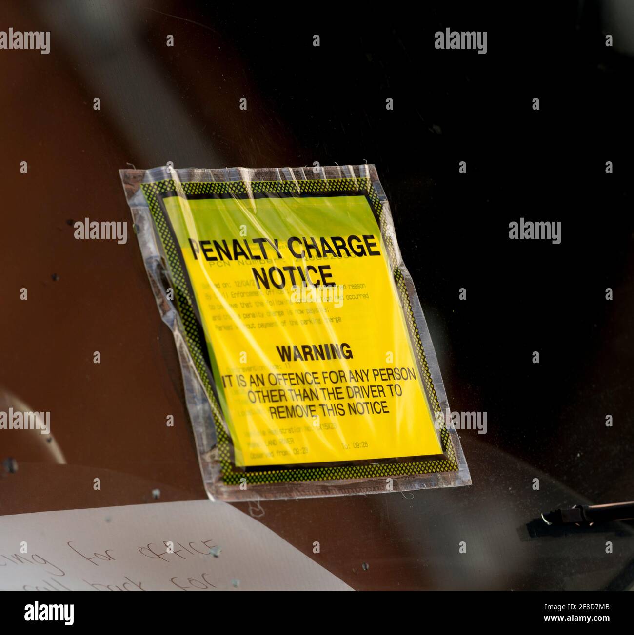 Parking ticket on windscreen hi-res stock photography and images - Alamy