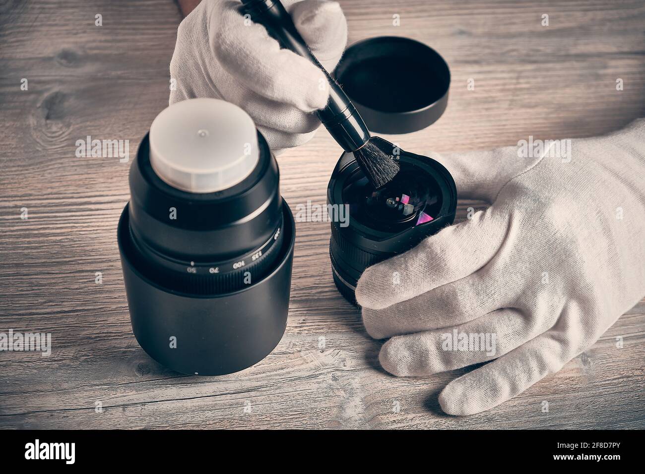 Man cleaning lens digital hi-res stock photography and images - Alamy