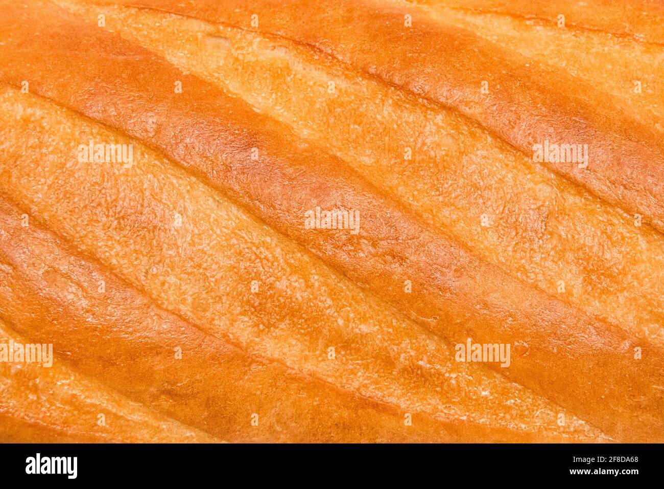 Fresh long loaf texture bakery background, close-up Stock Photo - Alamy
