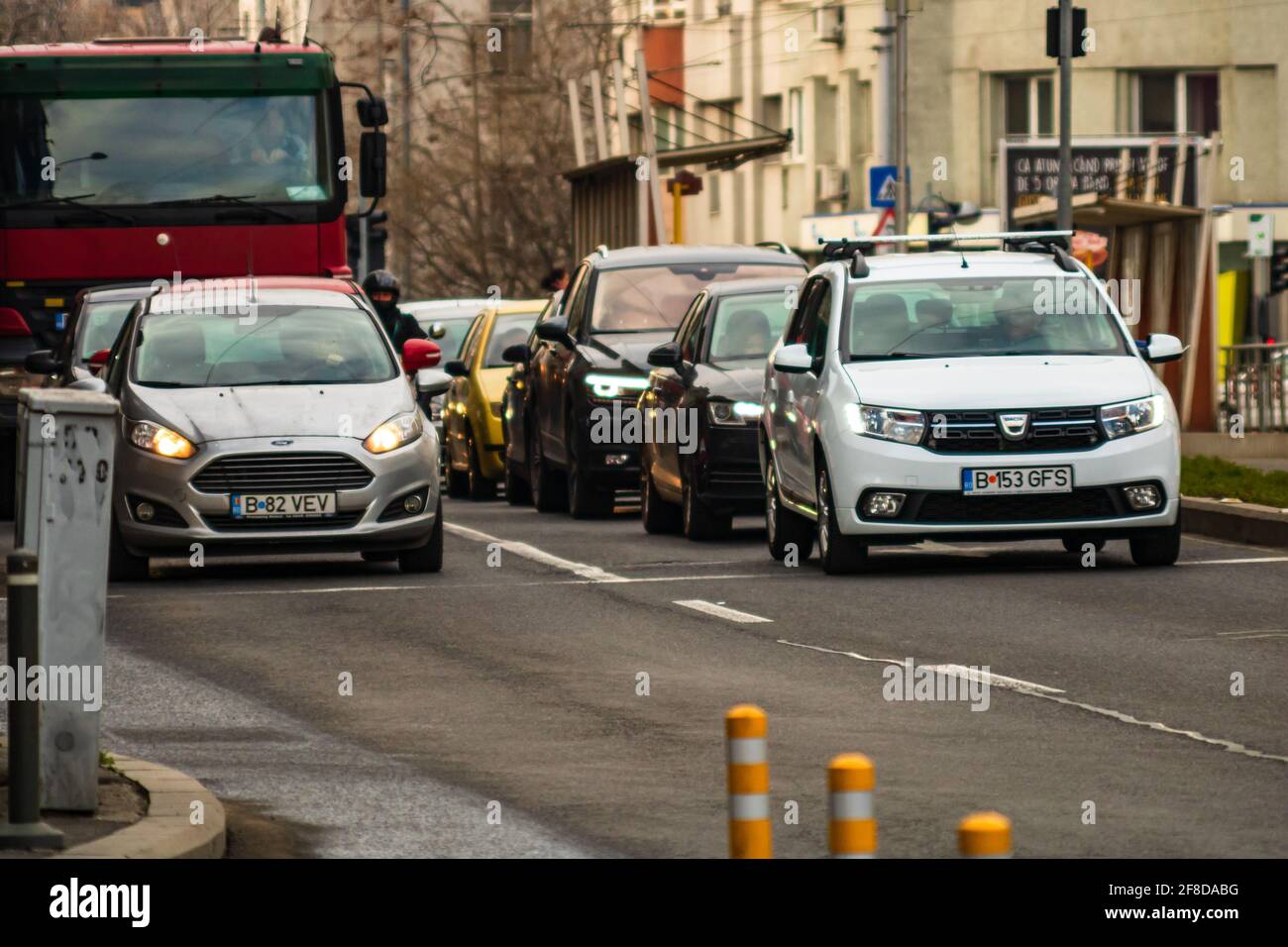 Car traffic at rush hour in downtown area of the city. Car pollution ...