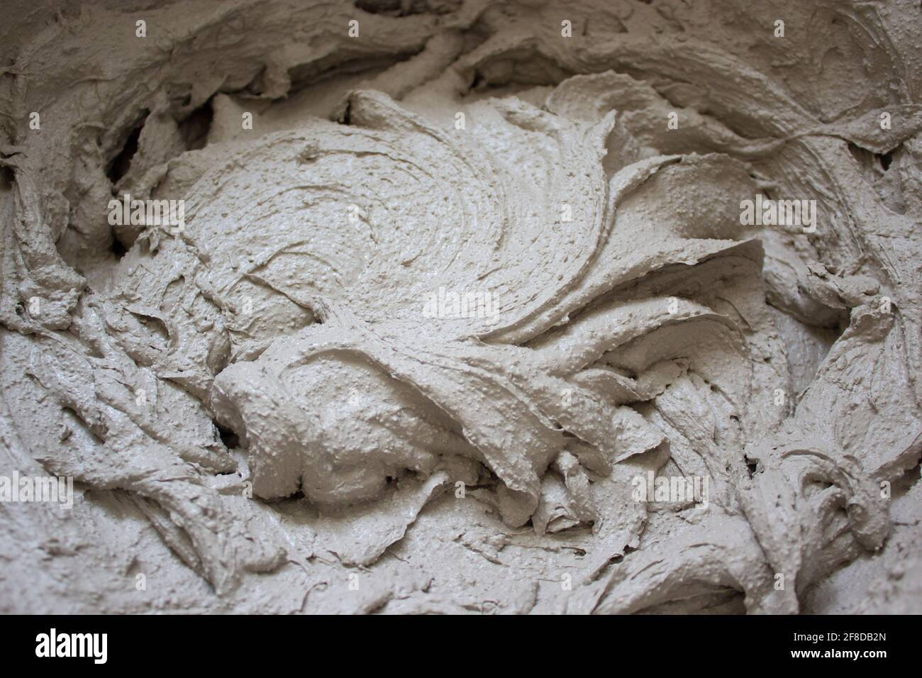 Gypsum plaster symbol. Gypsum plaster in a bucket, prepared for ...