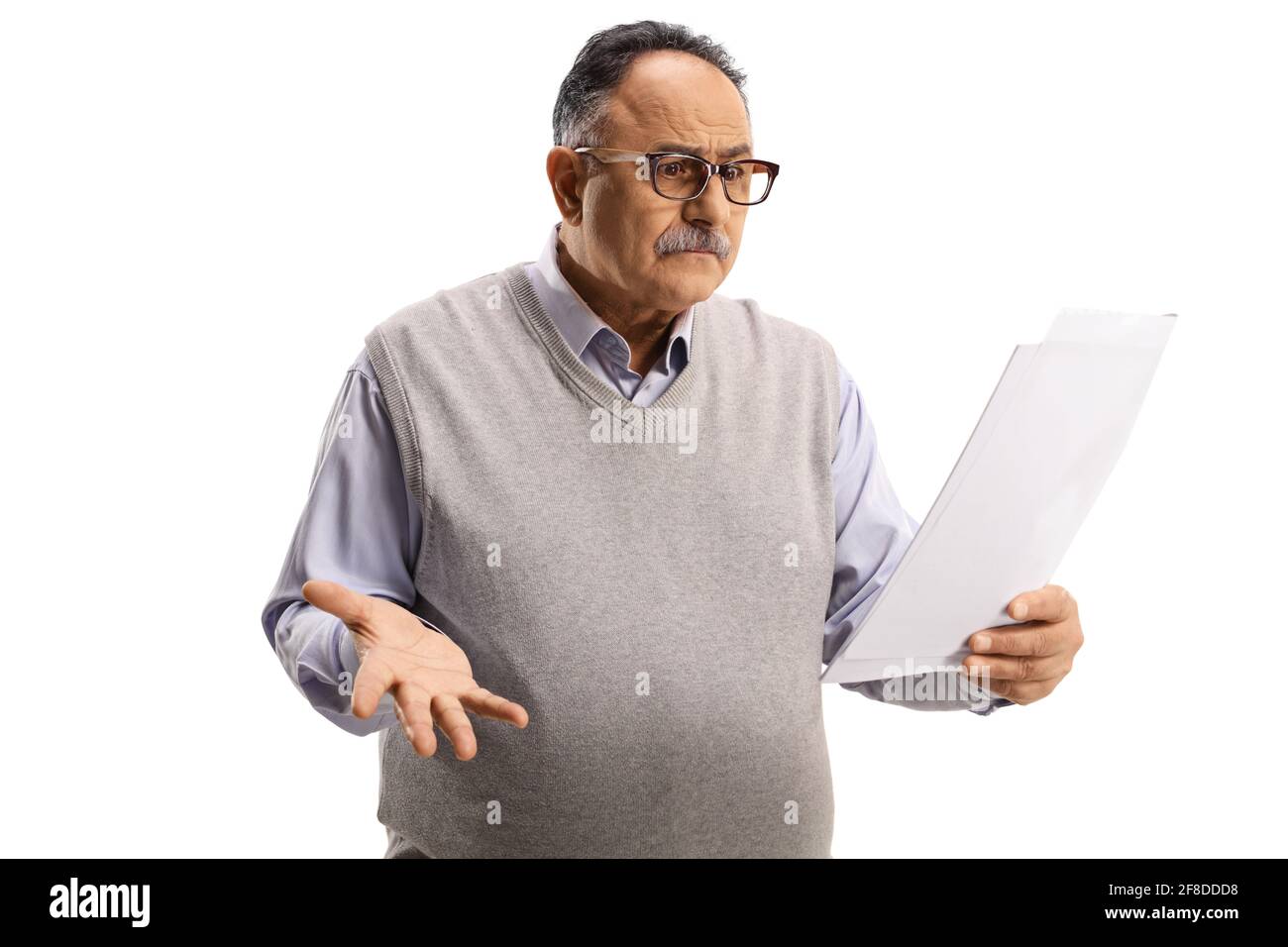 Confused mature man holding a paper document isolated on white ...