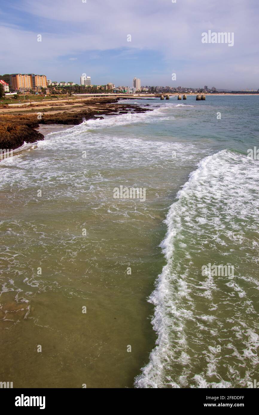 Port Elizabeth, South Africa - small waves break against the rocks at ...