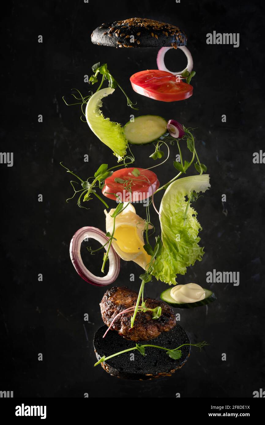 Flying hamburger ingredients on hi-res stock photography and images - Alamy