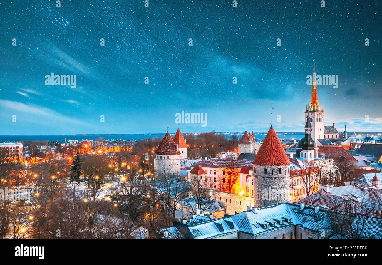 Tallinn, Estonia. Night Starry Sky Above Old Castle Walls Architecture ...