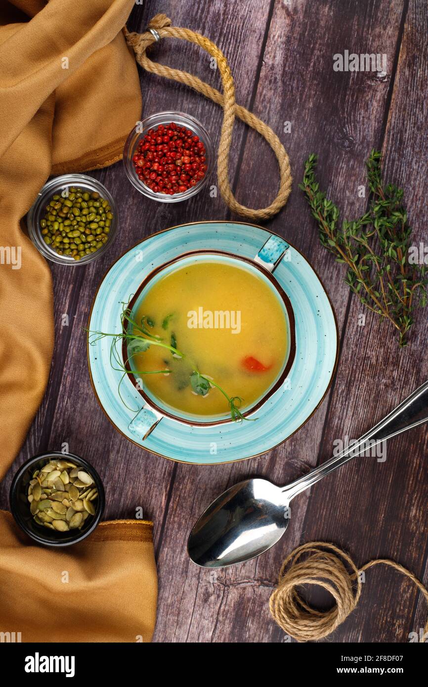 Fresh fish soup with ingredients and spices for cooking. Wooden ...