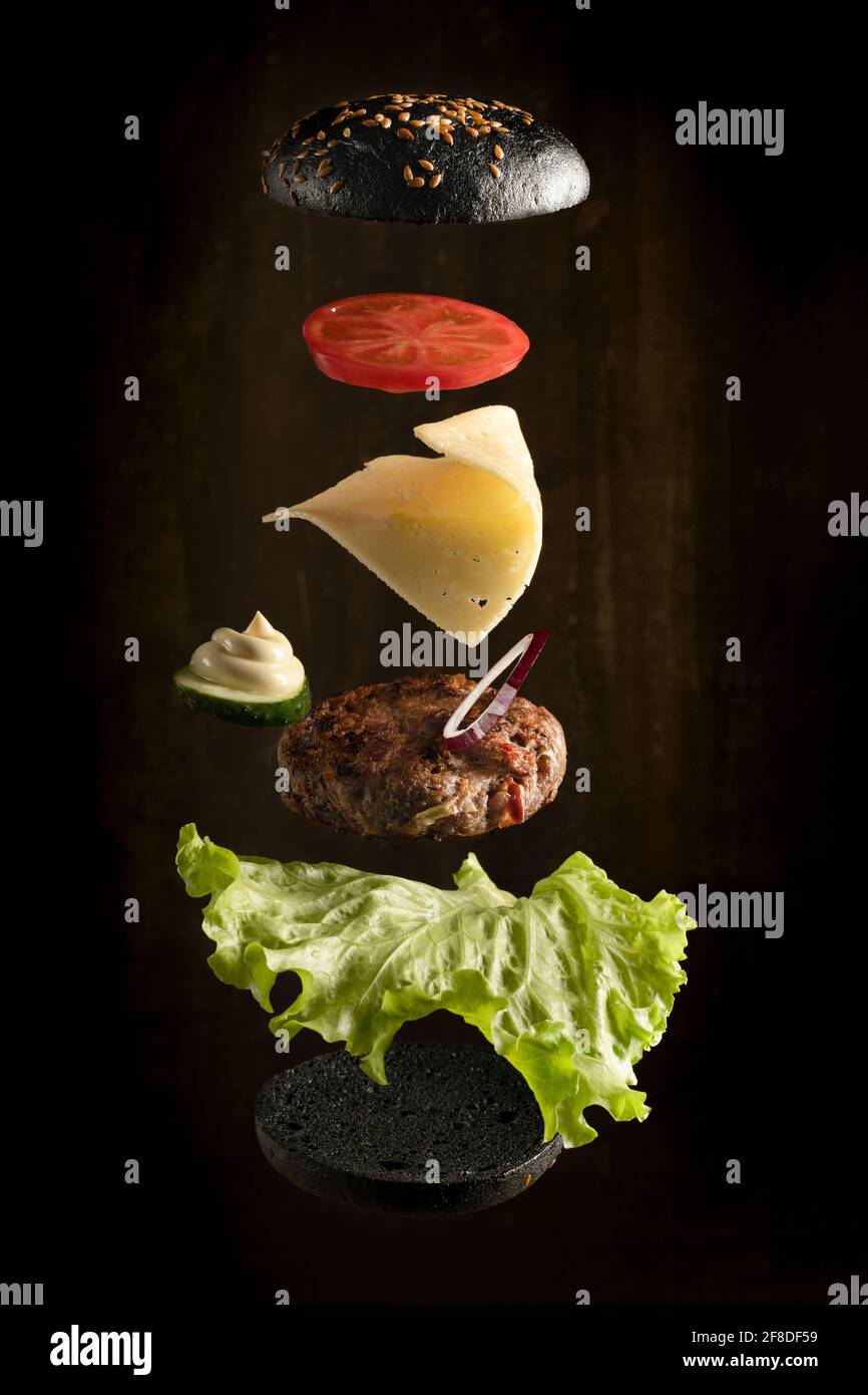 Sandwich floating ingredients burger hi-res stock photography and ...