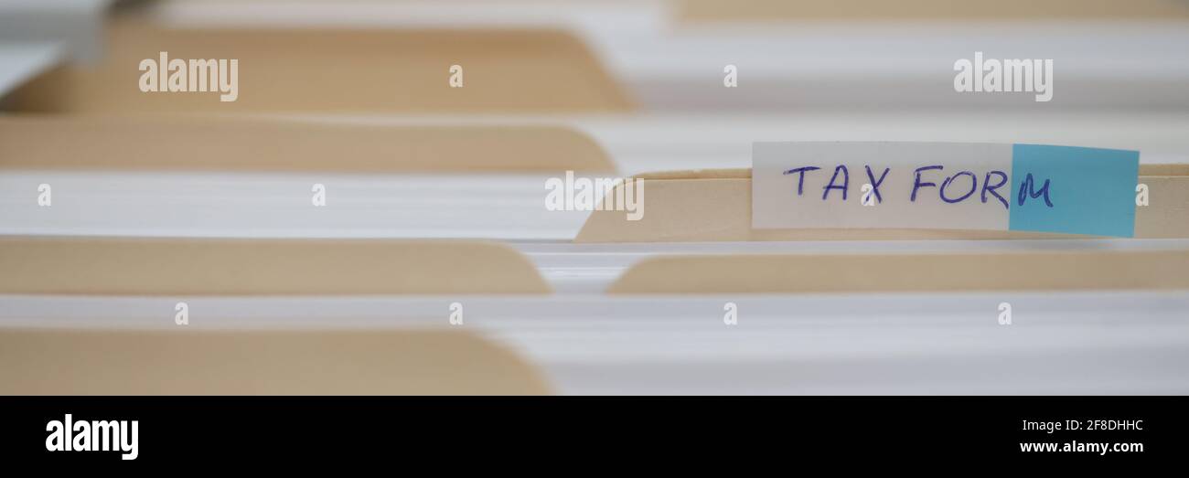 Folders with documents of the tax form Stock Photo - Alamy