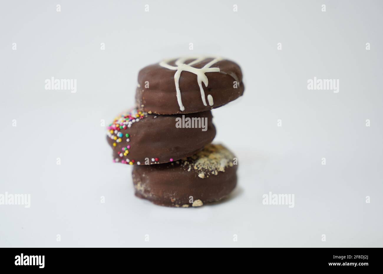 Closeup shot of sweet chocolate candies isolated on white background ...