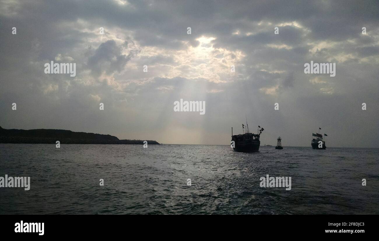 Beautiful view of fishing boats floating on the sea Stock Photo - Alamy