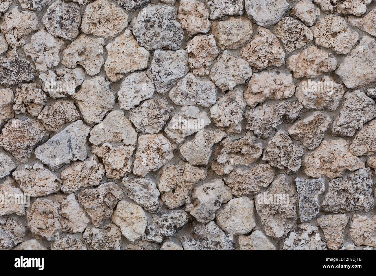 Stone wall texture of natural limestone Stock Photo - Alamy