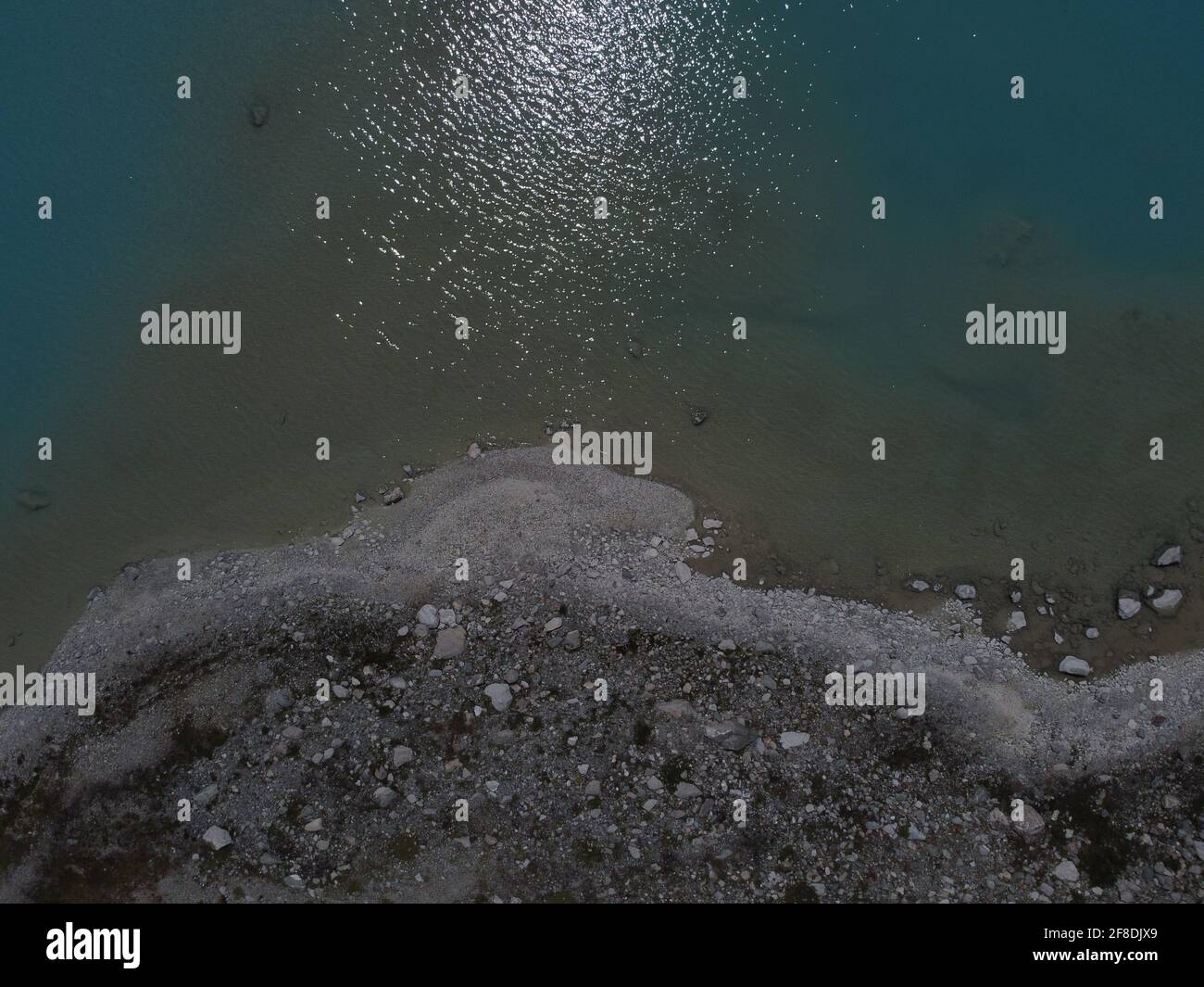 Aerial top view of geological mountain lake formation with the ...