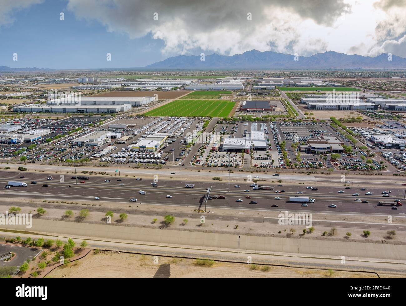 Aerial top view of typical a Avondale small town shopping center with ...