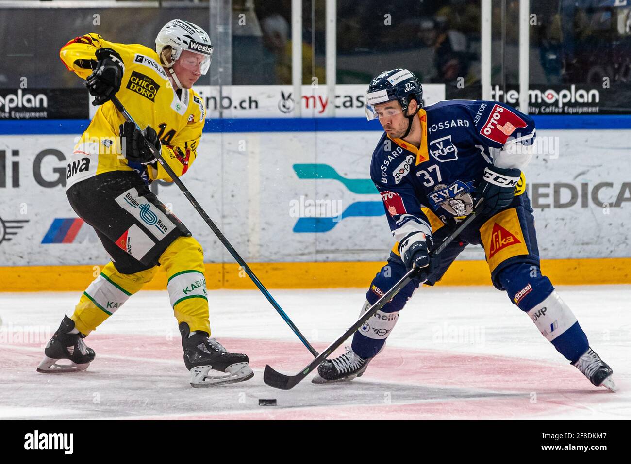 Bossard Arena in Zug. April 13, 2021, Nick Shore # 37 (EV Zug) leaves ...