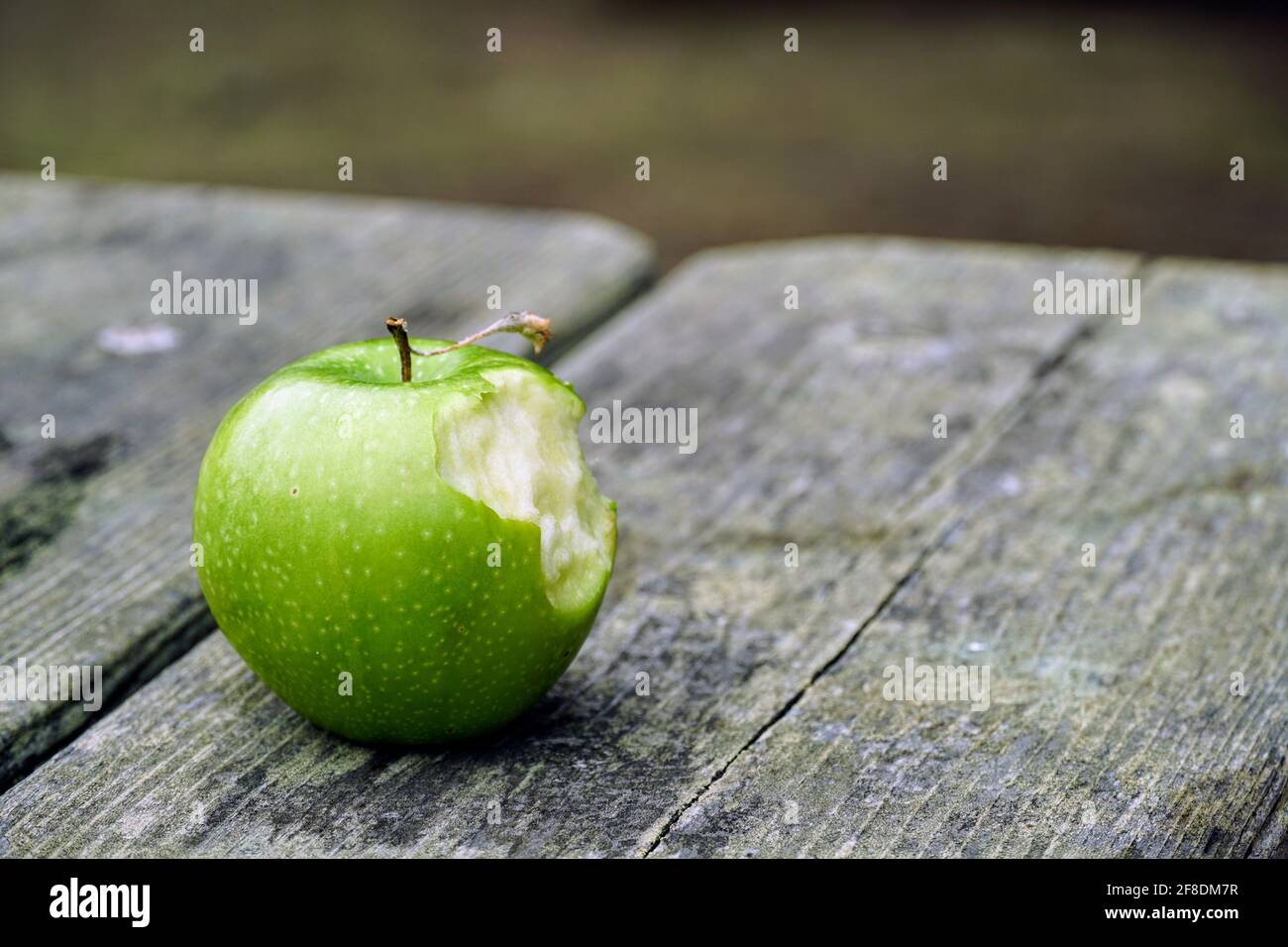 Bitten apple table hi-res stock photography and images - Alamy