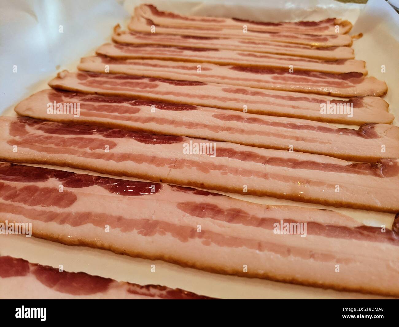 Closeup of sliced pork bacon ready for cooking Stock Photo - Alamy