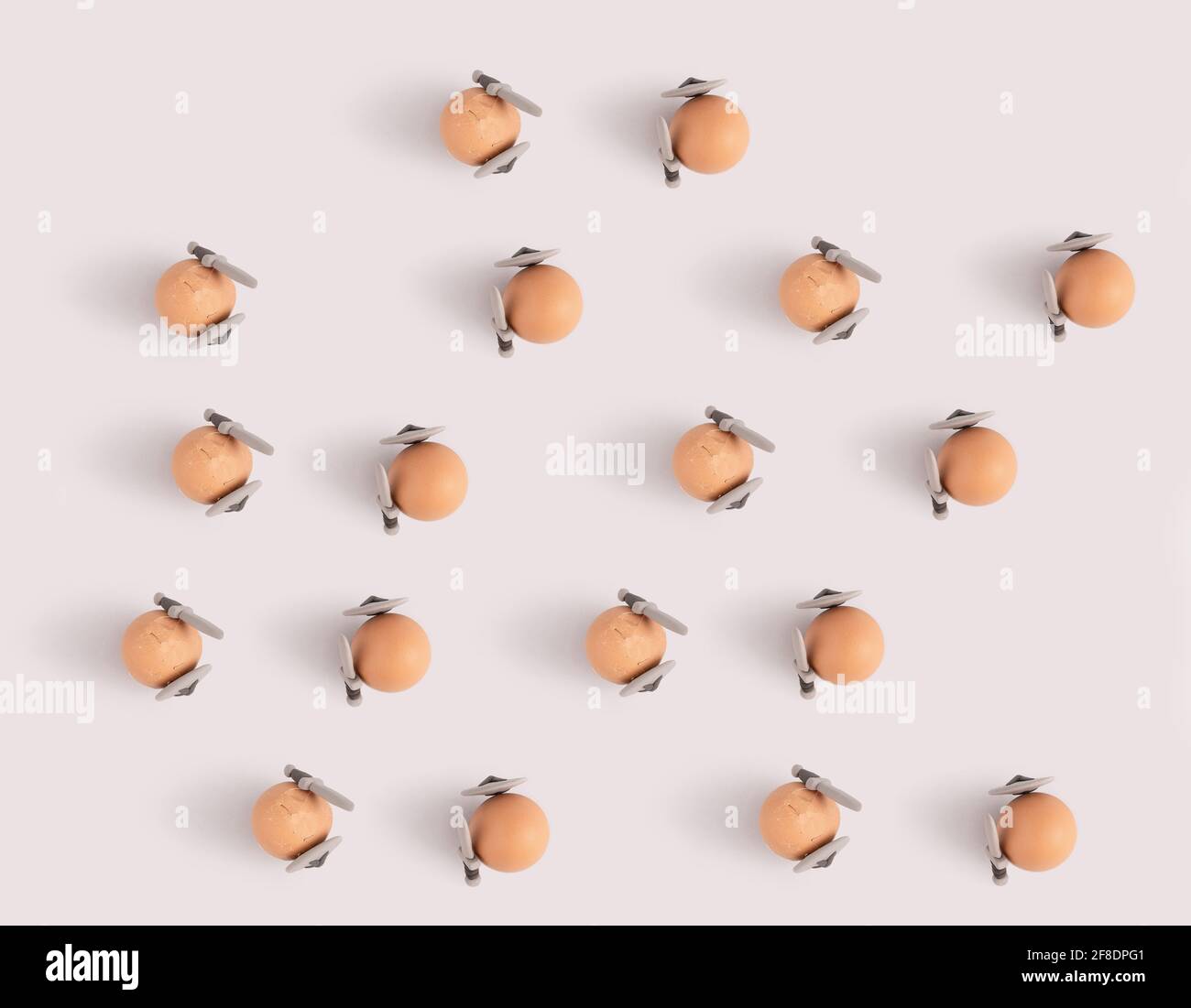 Creative Easter eggs fighting with swords and shields isolated on white ...