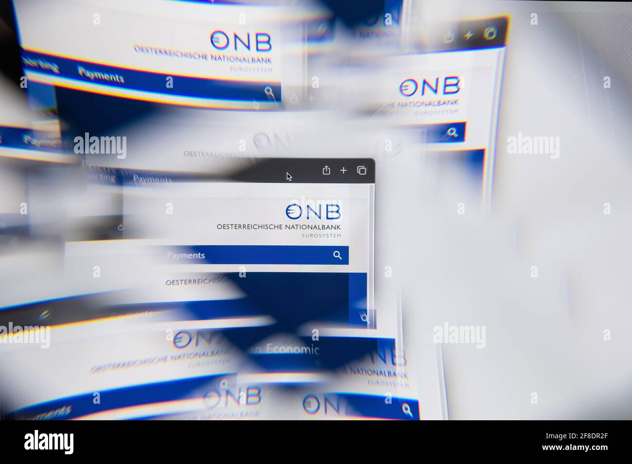 Milan, Italy - APRIL 10, 2021: Oesterreichische Nationalbank logo on laptop screen seen through ...