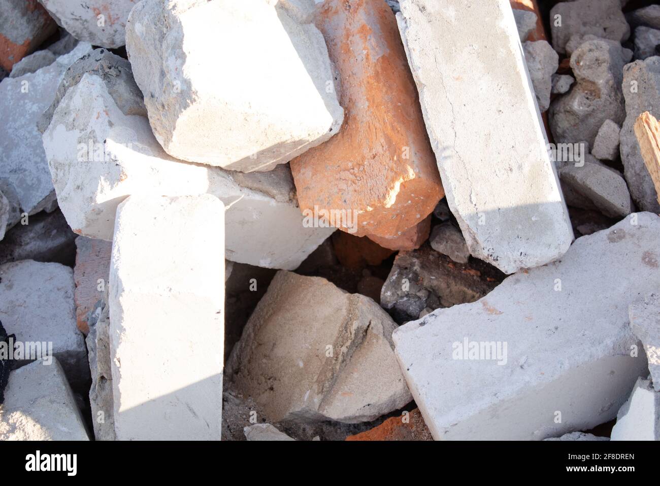 pile of old used bricks. background. construction of houses Stock Photo ...