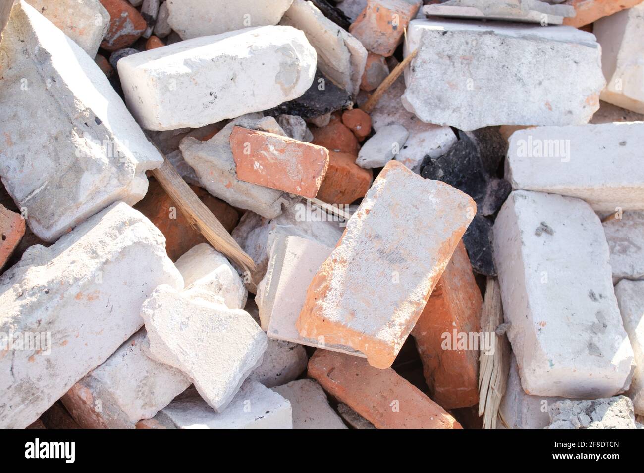 pile of old used bricks. background. construction of houses Stock Photo ...