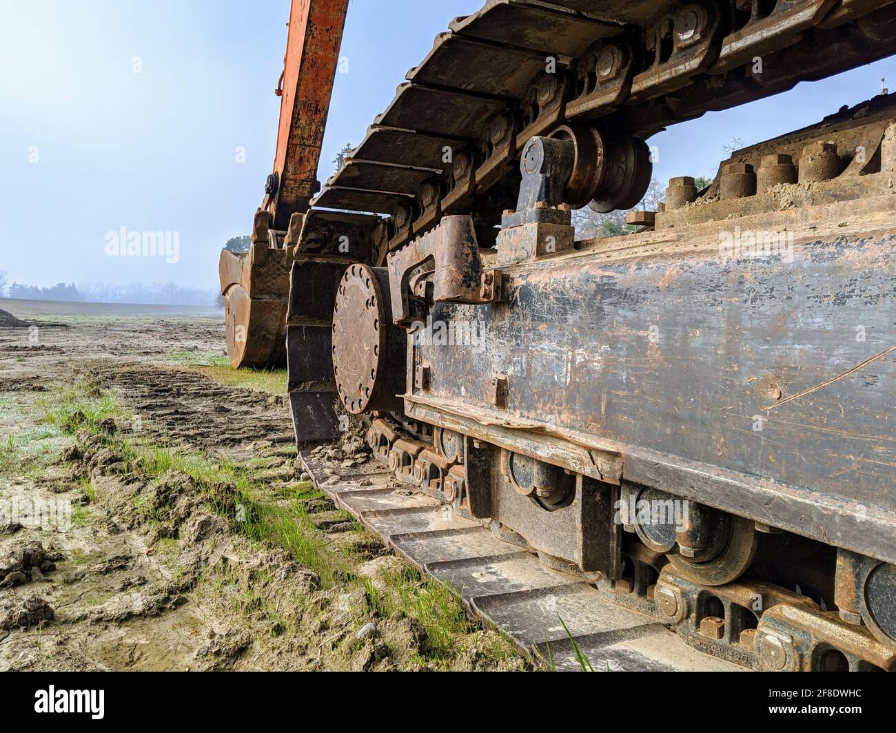 Side view of an excavator in the industrial field Stock Photo - Alamy